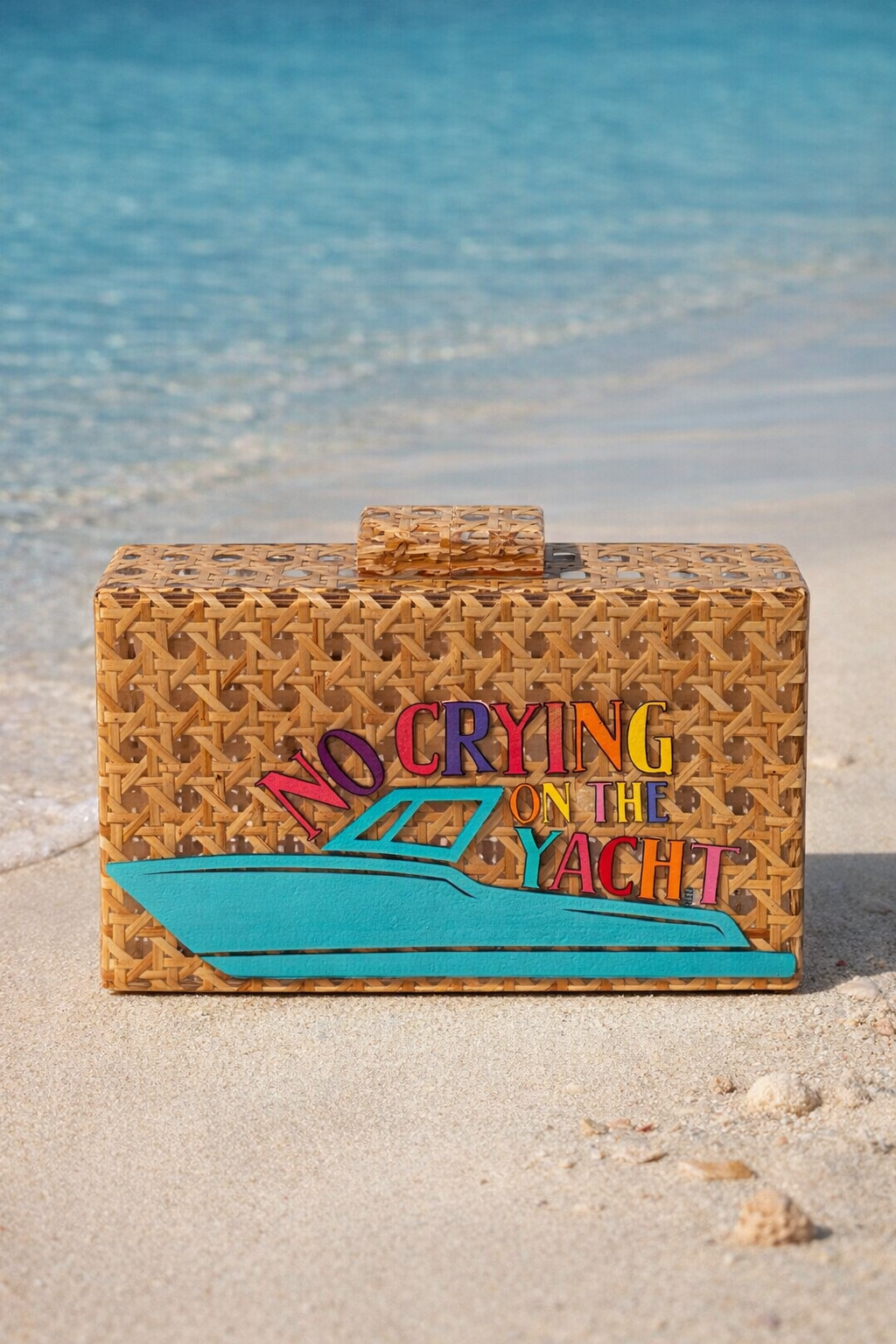 NO CRYING ON THE YACHT WOVEN CLUTCH – Judith March